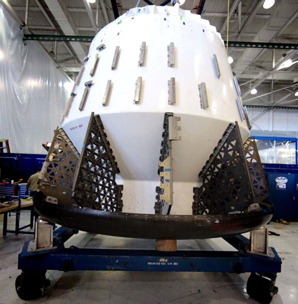 Backbone of Dragon 2 spacecraft undergoing structural load testing : r ...